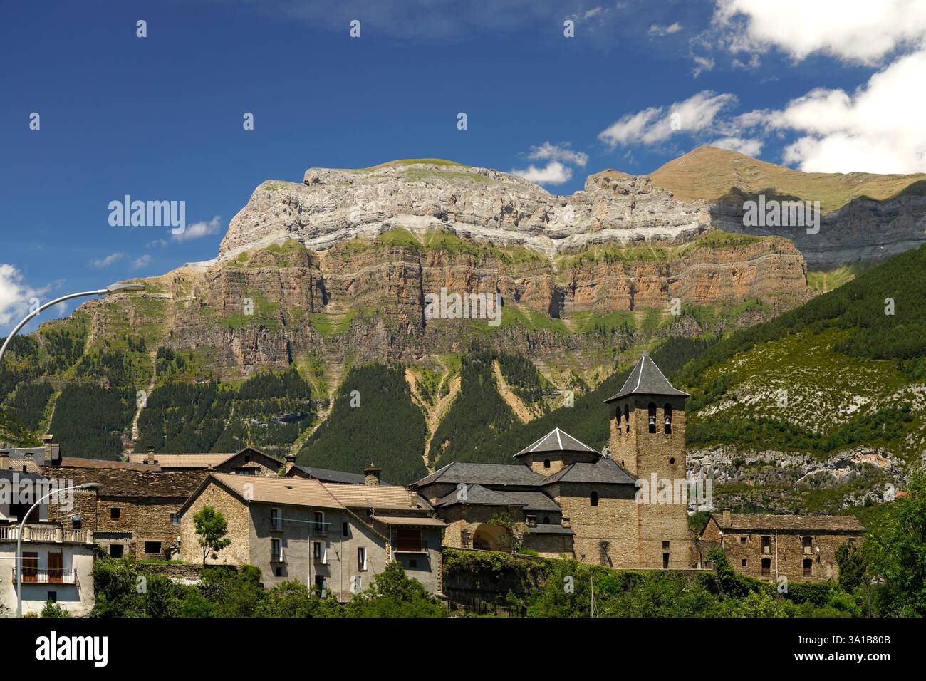 The Iglesia de San Salvador church in Torla and the Monte Perdido ...