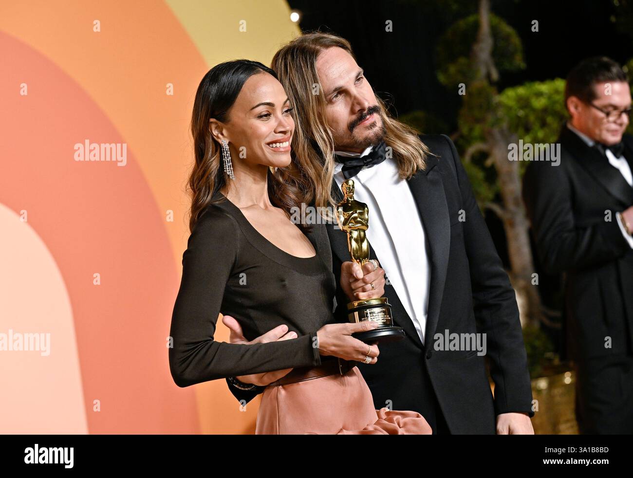 Zoe Saldana, left, and husband Marco Perego-Saldana arrive at the ...