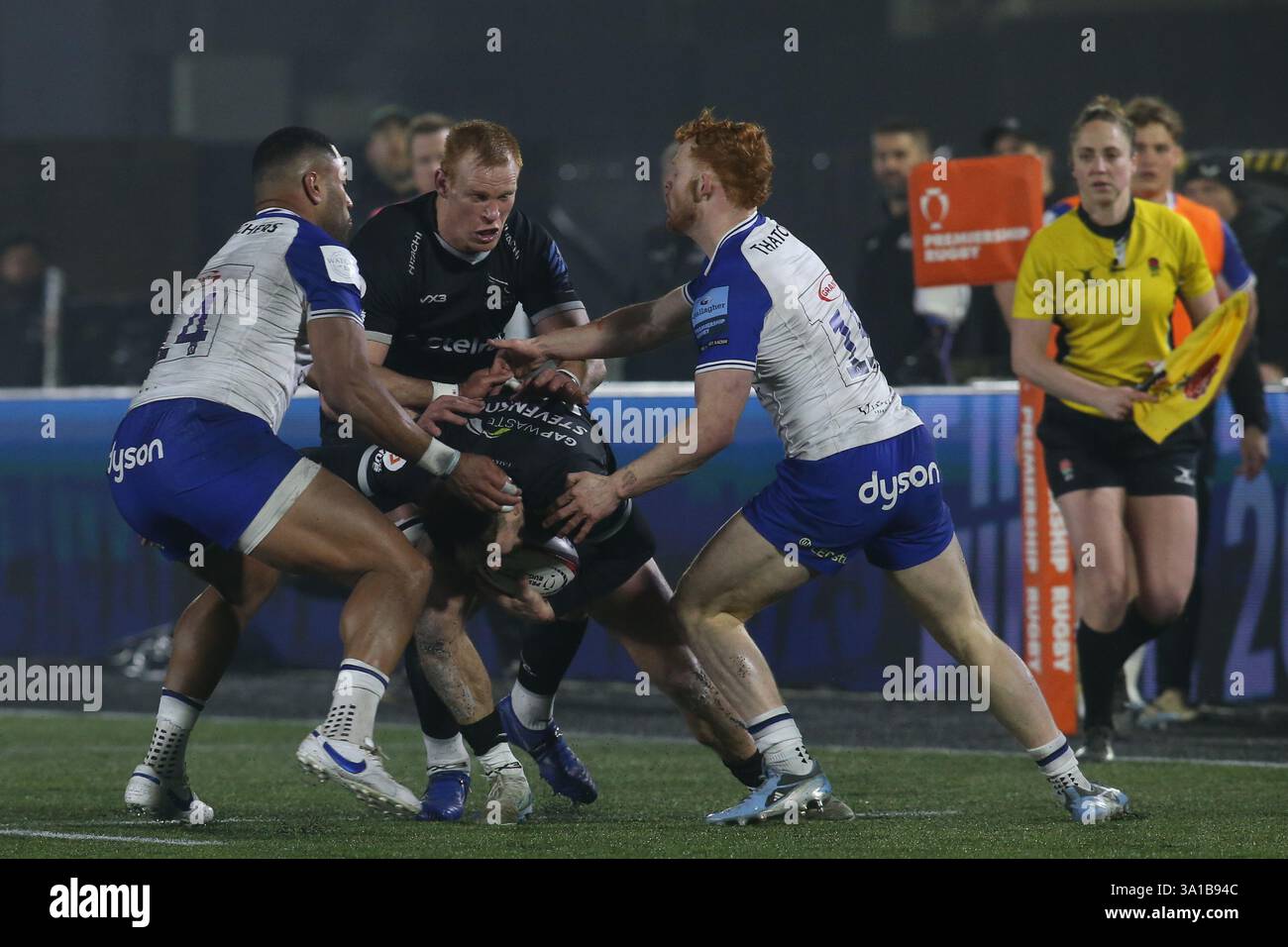 Newcastle Falcon's Ben Stevenson, is tackled during the Premiership Cup ...