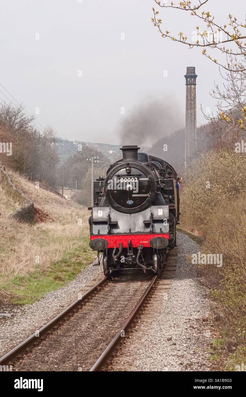 Steam engine number 80002 pulling classic passenger carriages ...