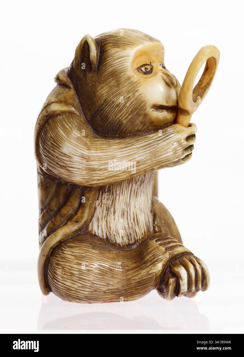 Netsuke (monkey with magnifying glass), about 1850 Stock Photo - Alamy