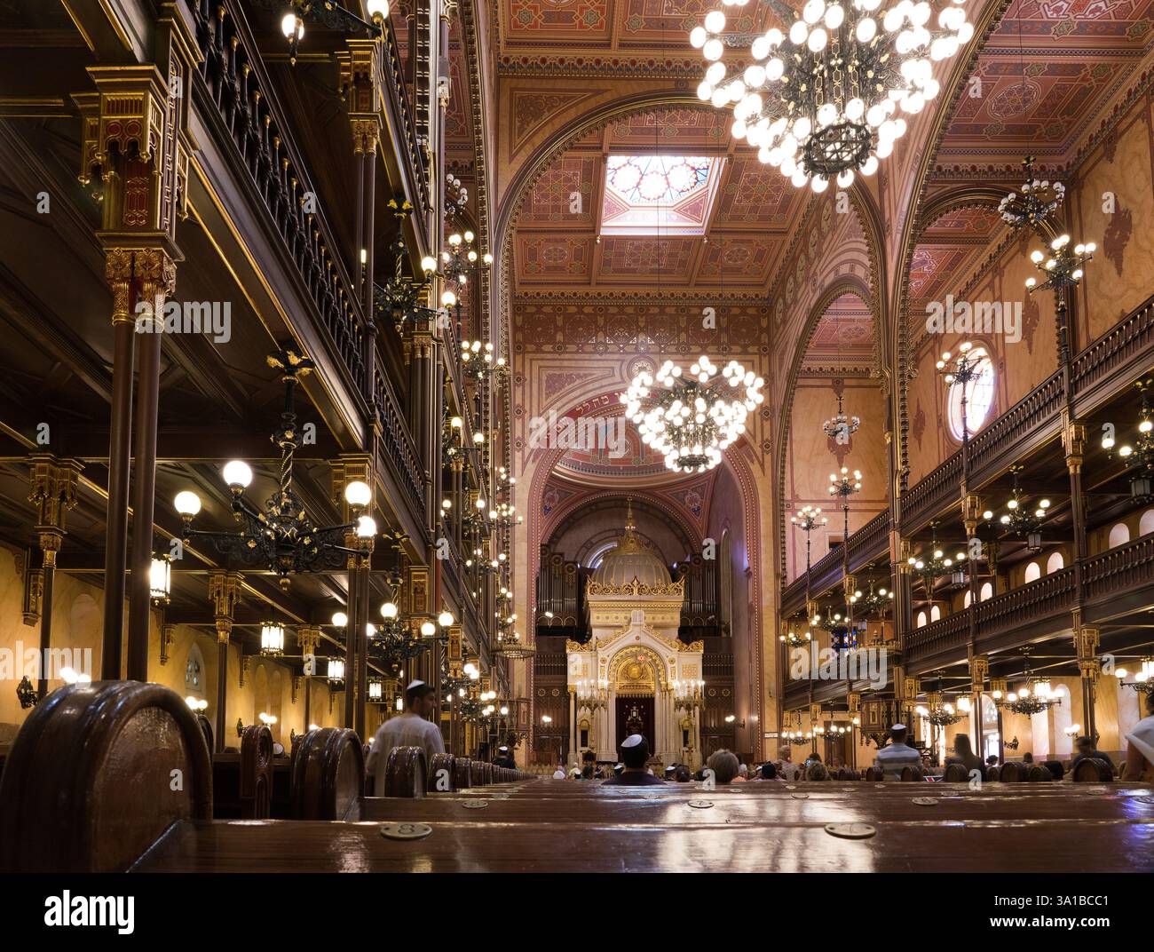 Interior of the Great Synagogue, Budapest, Hungary. Worshipers attend ...