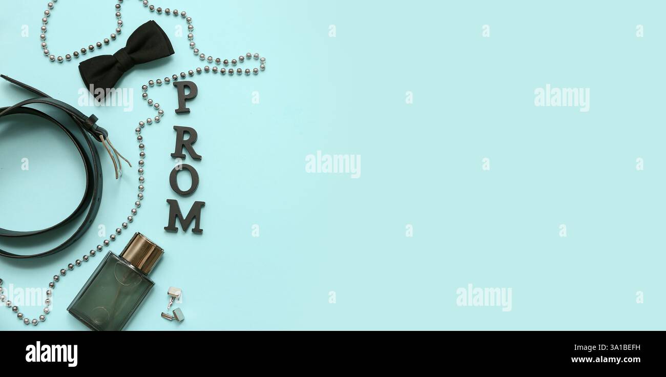 Word PROM, belt, bowtie and perfume on light blue background with space ...