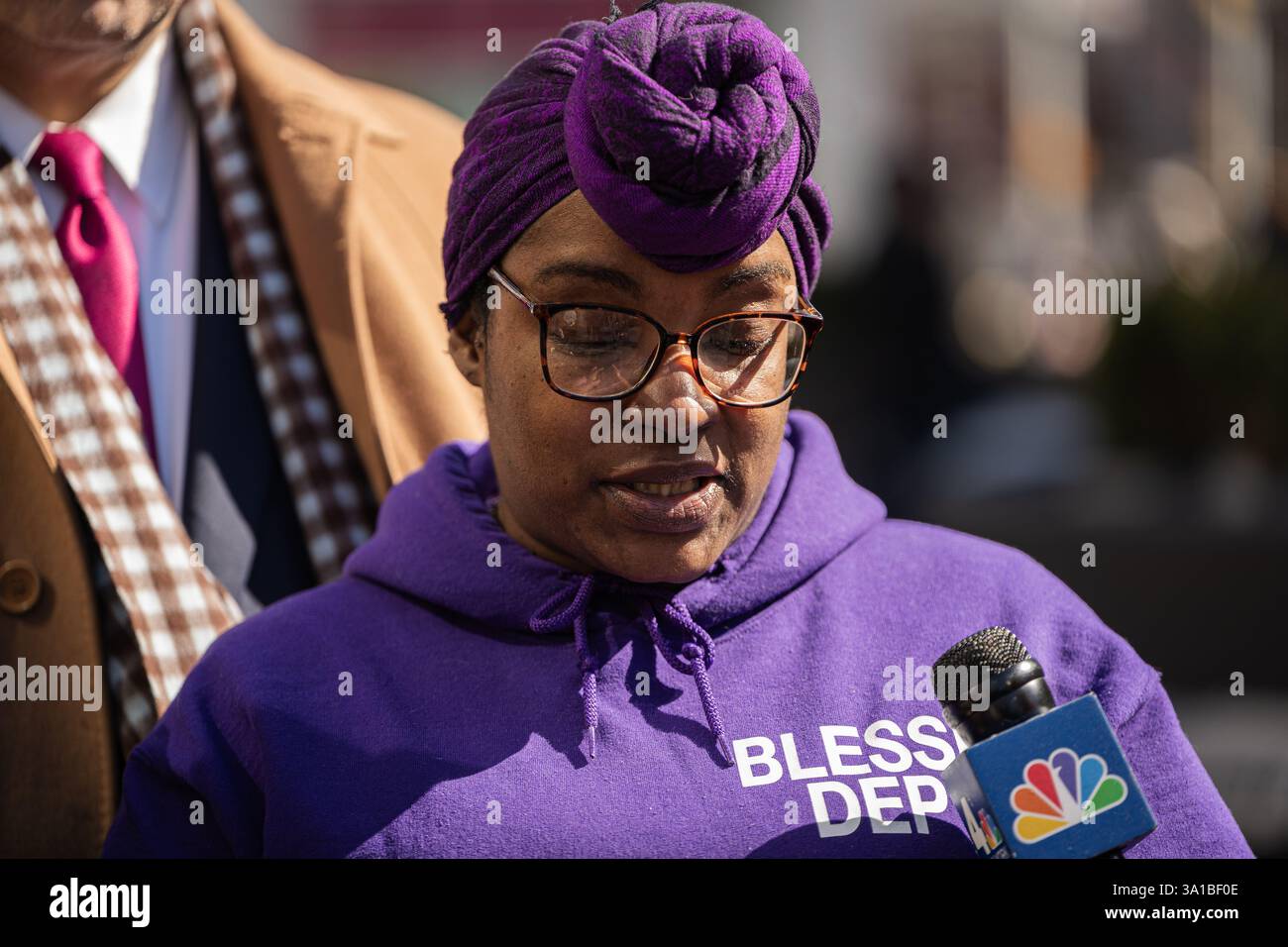 Family members of Messiah Nantwo speak to reporters as Rev. Kevin ...