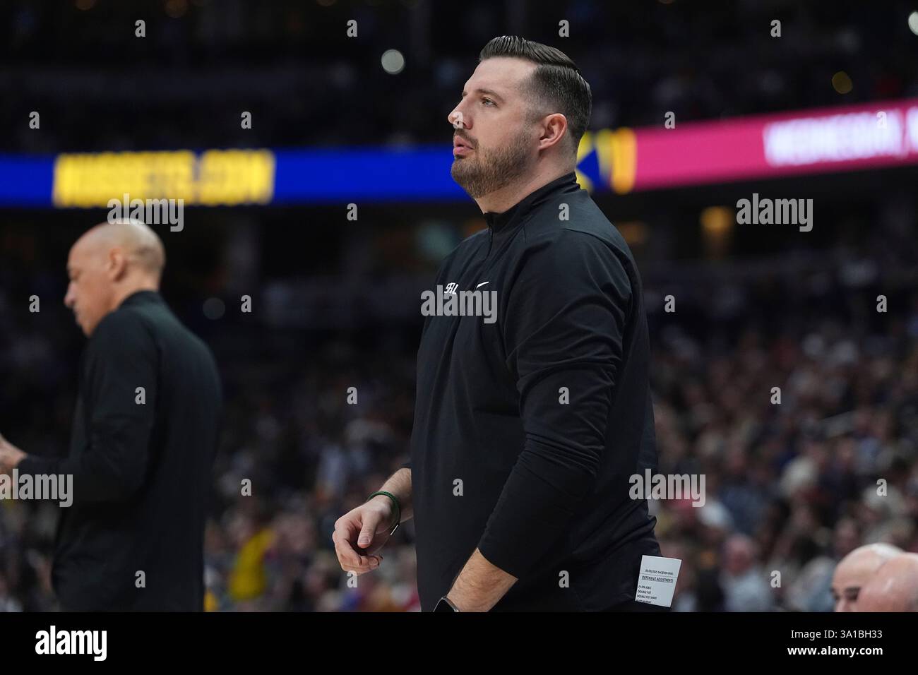 Sacramento Kings assistant coach Luke Loucks in the first half of an ...