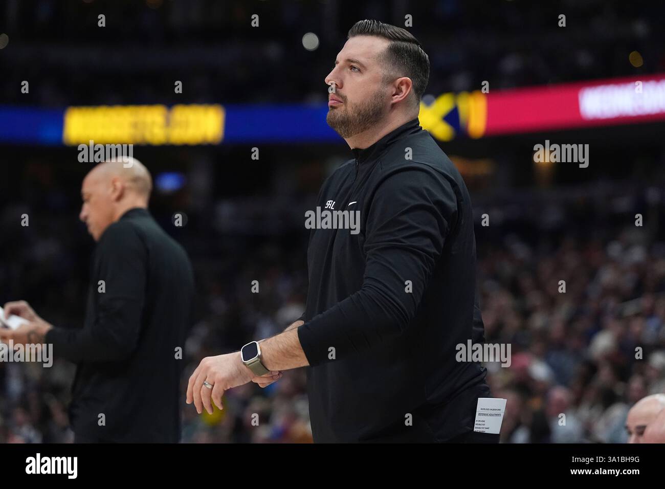 Sacramento Kings assistant coach Luke Loucks in the first half of an ...