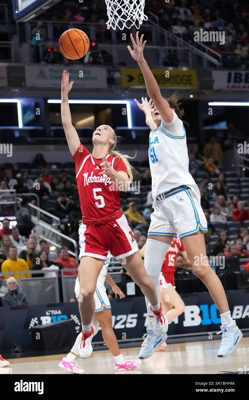 Nebraska guard Alberte Rimdal (5) shoots on UCLA center Lauren Betts ...