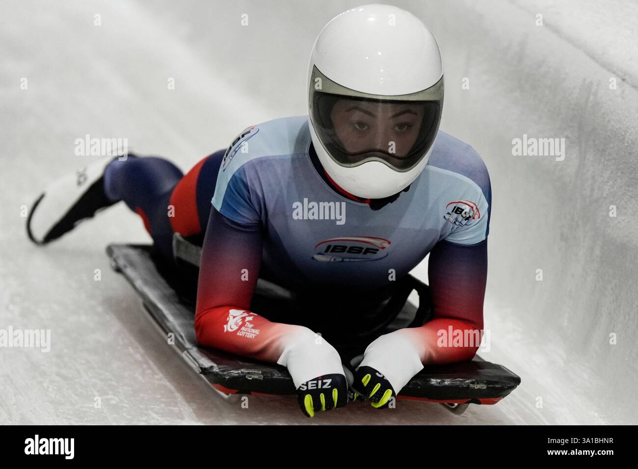 Tabitha Stoecker, of Britain, slides during fourth run at the skeleton ...