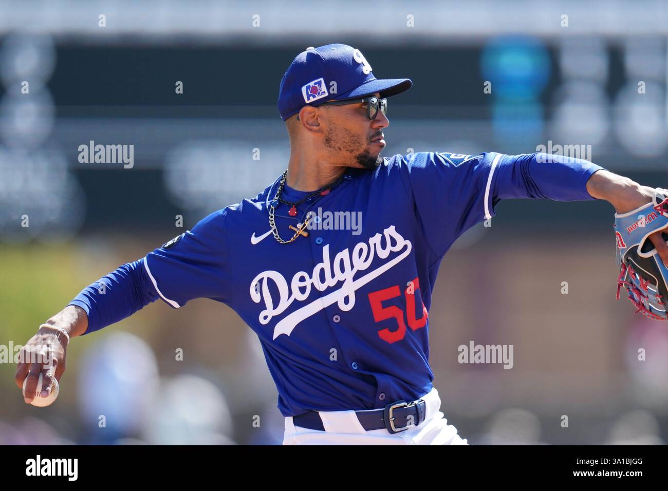 Los Angeles Dodgers shortstop Mookie Betts warms up during the third ...