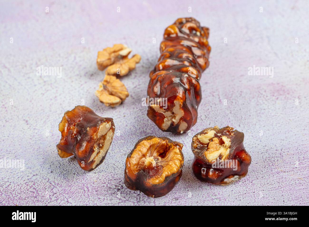 Grape Molasses Sausage with Walnuts. Traditional Turkish dessert ...