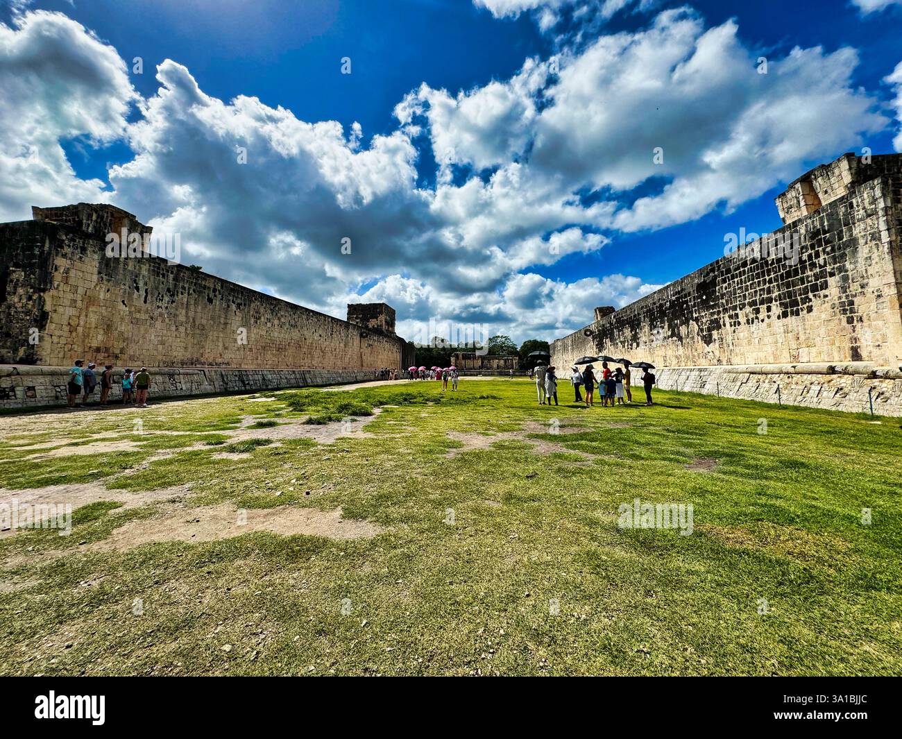 Tourists at the Great Ball Court of Chichen Itza,Juego de Pelota ...