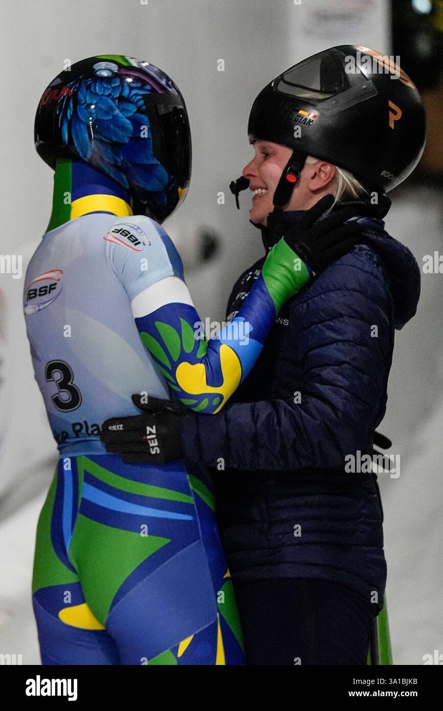 Nicole Rocha Silveira, of Brazil, speaks with a person during fourth ...