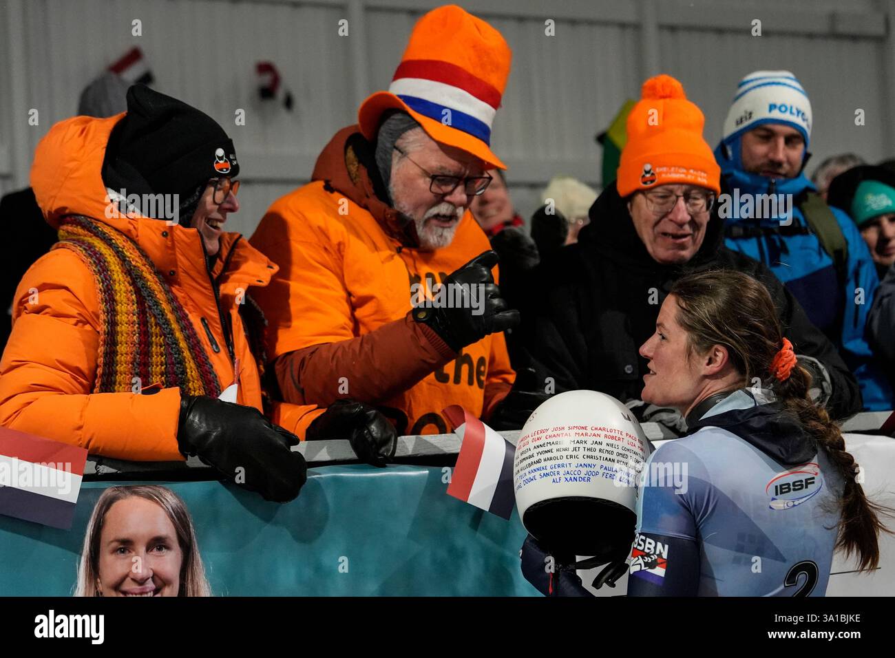 Kimberley Bos, of The Netherlands, speaks to people during fourth run ...