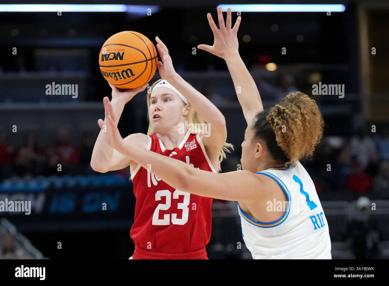 Nebraska guard Britt Prince (23) shoots on UCLA guard Kiki Rice (1 ...