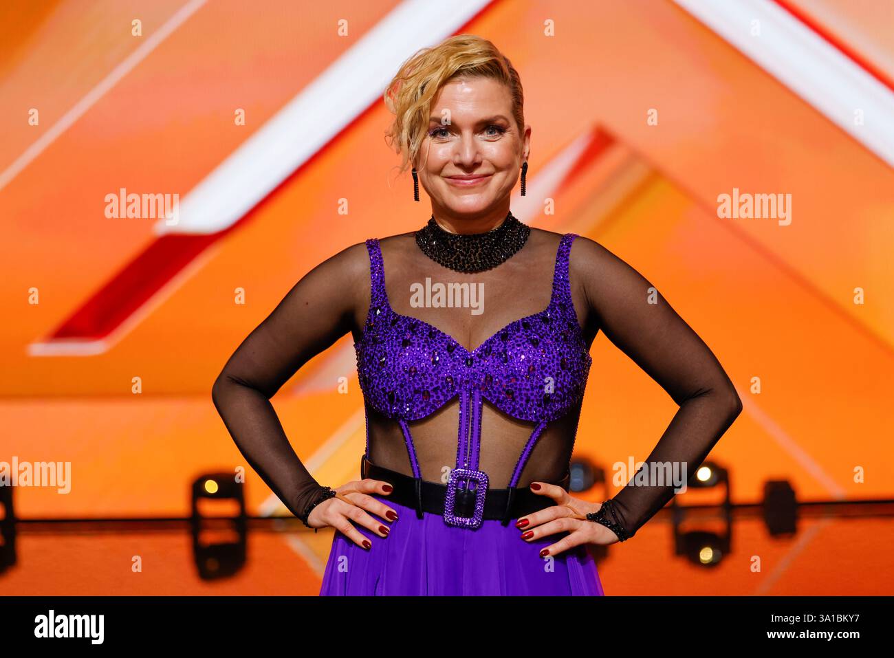Cologne, Germany. 08th Mar, 2025. Jeanette Biedermann, musician, stands ...