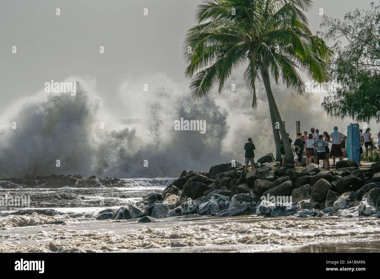 As Cyclone Alfred approaches the Gold Coast, a crowd gather at Snapper ...