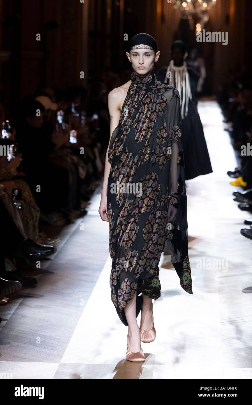 Model Lucy Fletcher walks on the runway during the Dries Van Noten ...