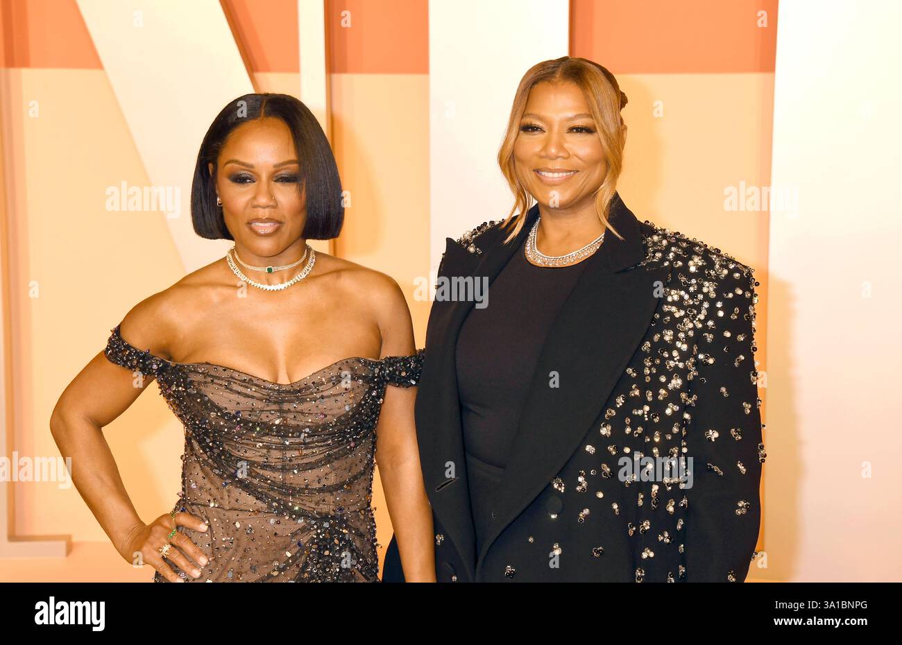 BEVERLY HILLS, CALIFORNIA - MARCH 02: Eboni Nichols and Queen Latifah attend the 2025 Vanity ...