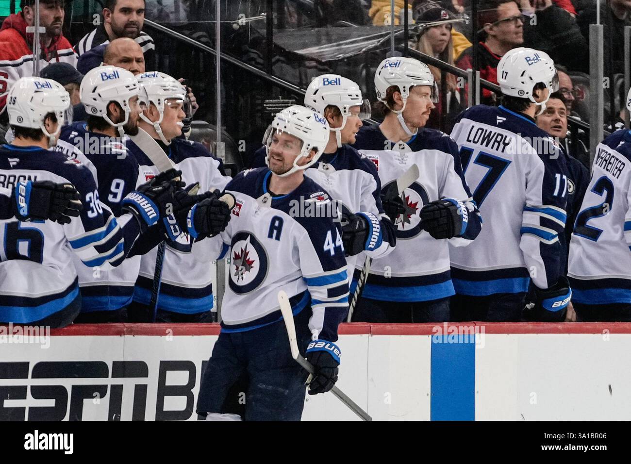 Winnipeg Jets' Josh Morrissey (44) celebrates with teammates after ...