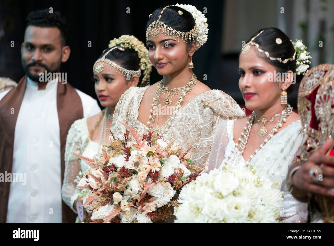 Colombo. 7th Mar, 2025. Models present creations at a bridal fashion ...
