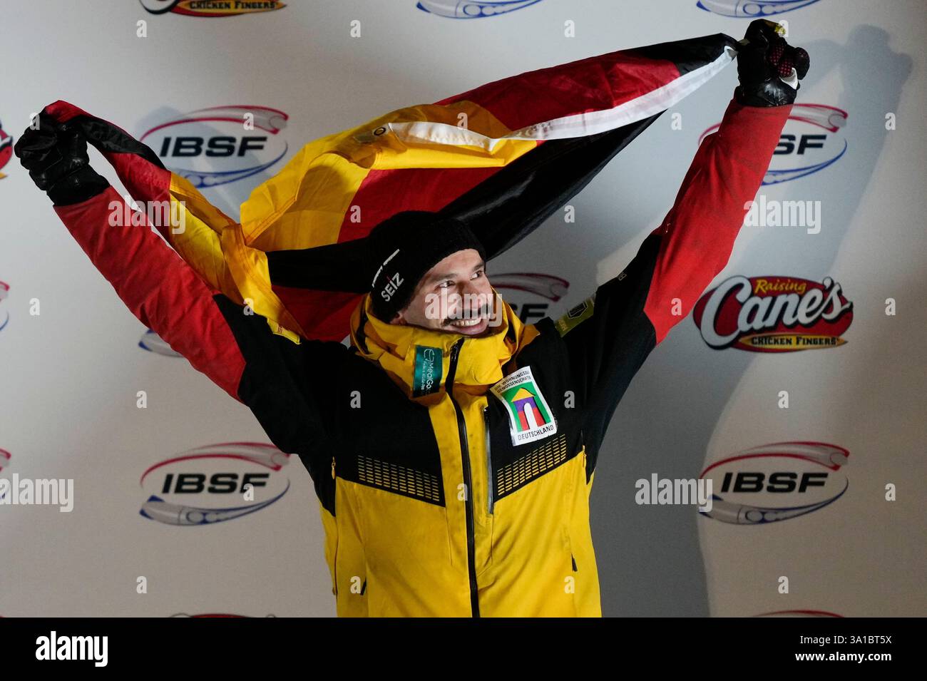 Axel Jungk, of Germany, third place, poses for a photo during the medal ...