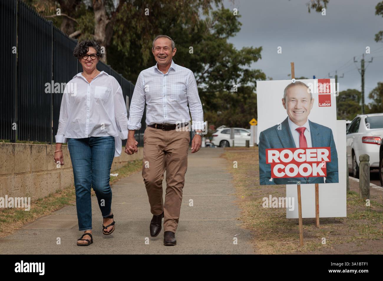 Western Australia Premier, Roger Cook arrives with his wife Carly Lane ...