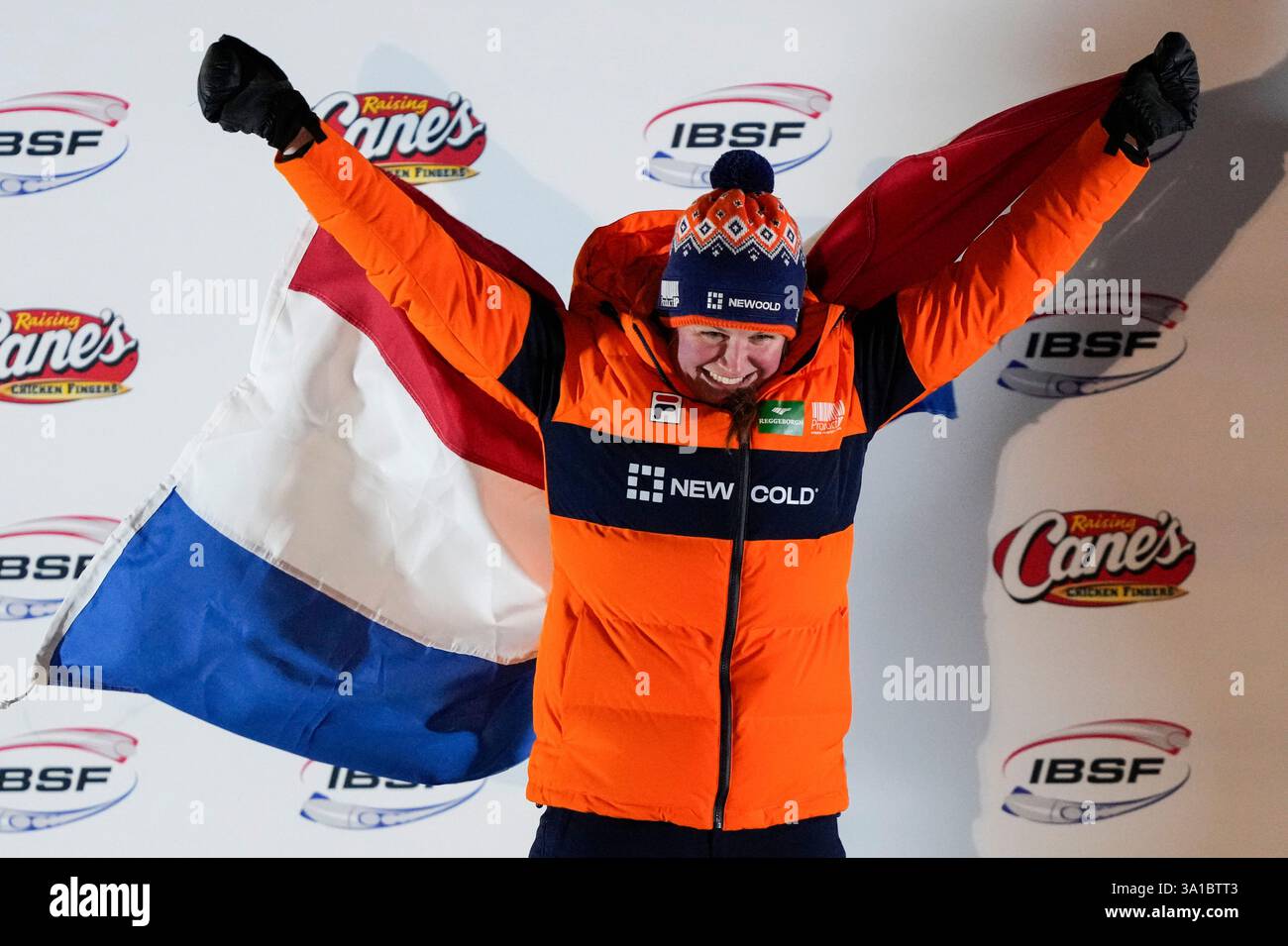 Kimberley Bos, of The Netherlands, celebrates her first place win ...