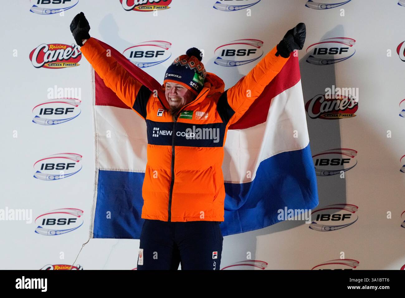 Kimberley Bos, of The Netherlands, celebrates her first place win ...