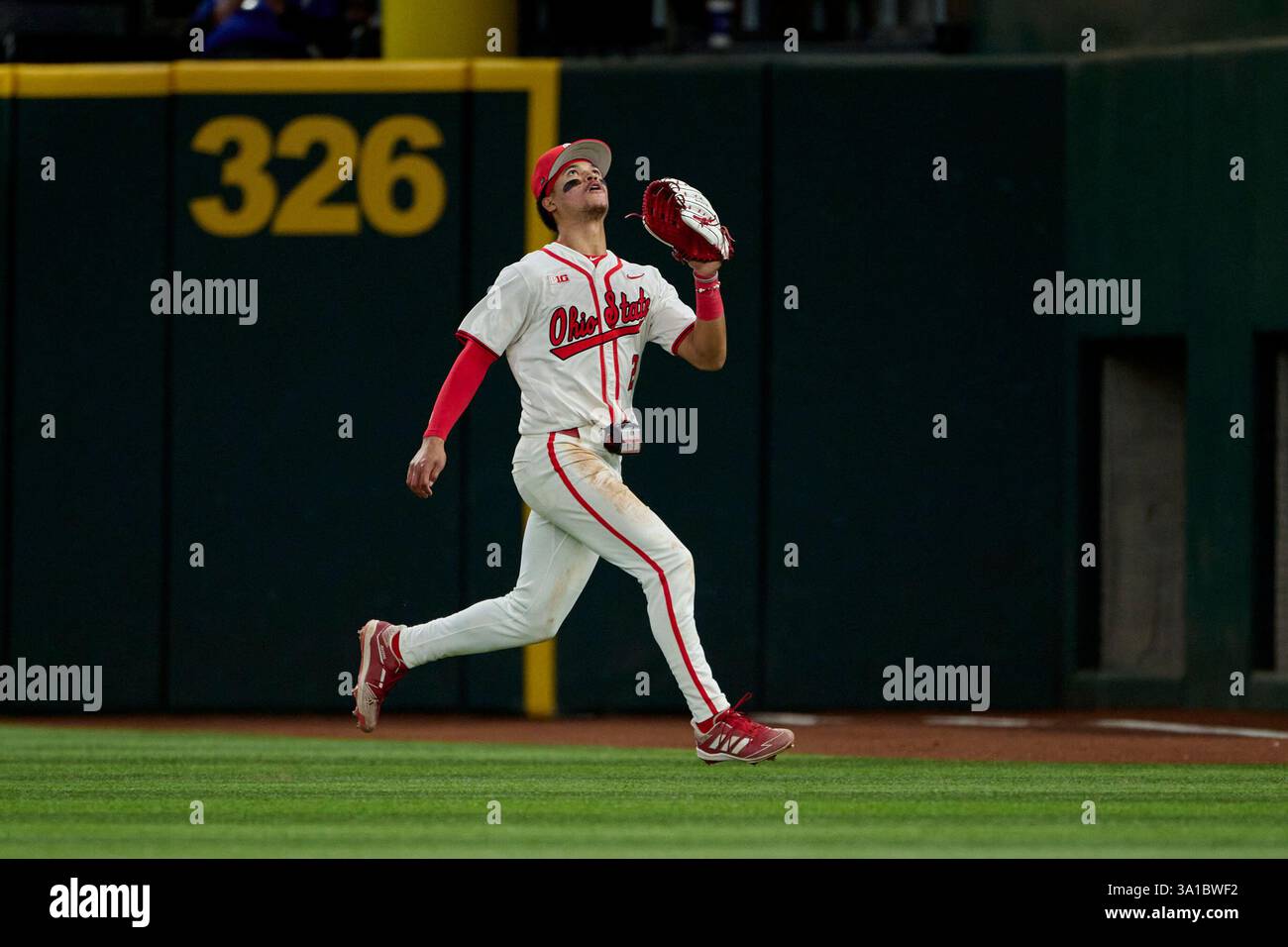 Ohio State Buckeyes outfielder Trey Lipsey (2) catching a fly ball ...