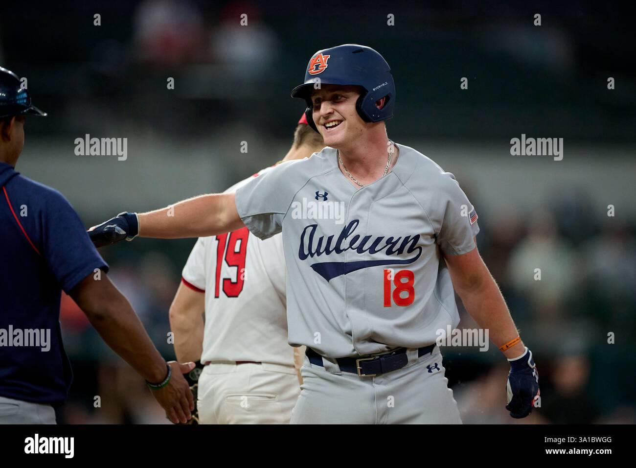 Auburn Tigers Ike Irish (18) celebrates an RBI single during an NCAA ...