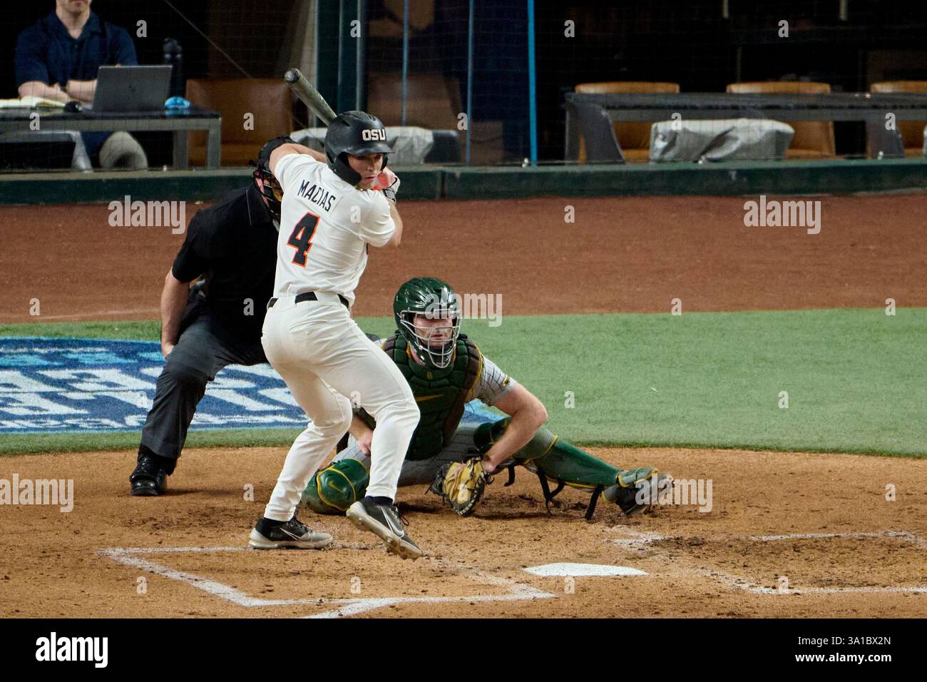 Oregon State Beavers Dallas Macias (4) at bat in front of catcher ...