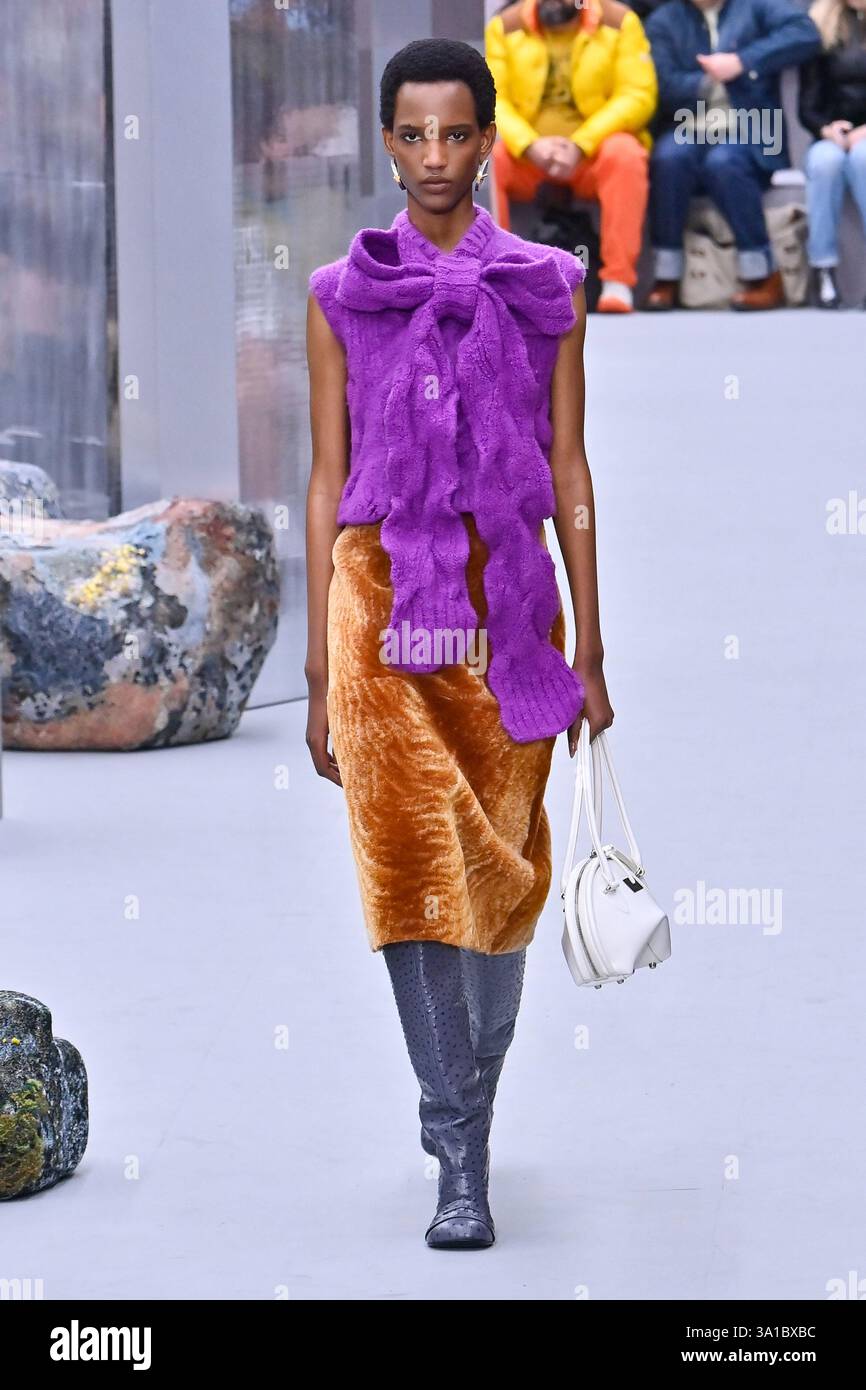 Model Edna Karibwami walks on the runway during the Acne Ready to Wear ...