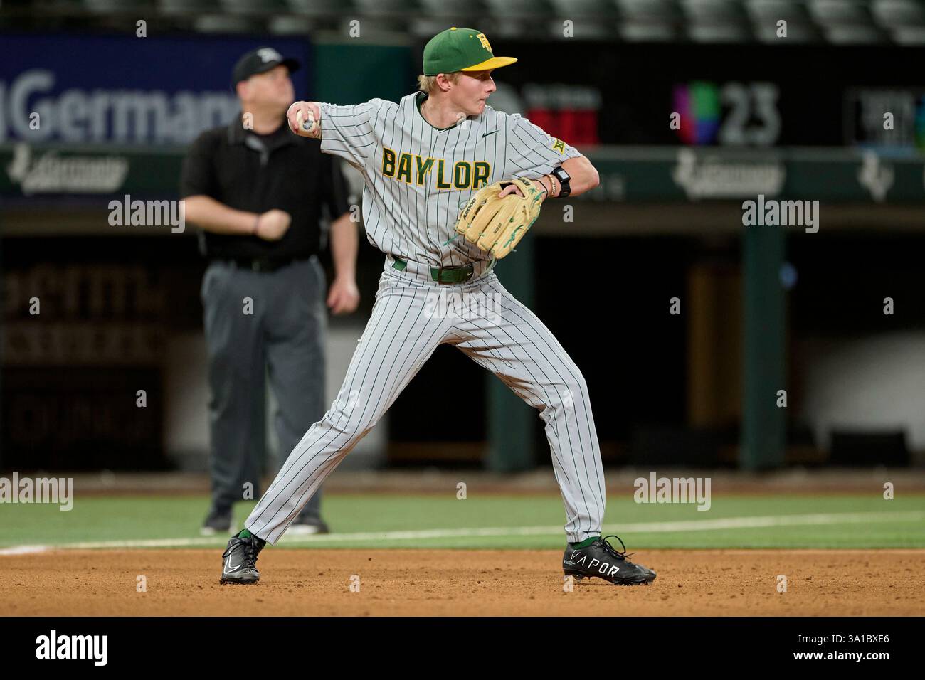 Baylor Bears third baseman Pearson Riebock (5) throws the ball around ...