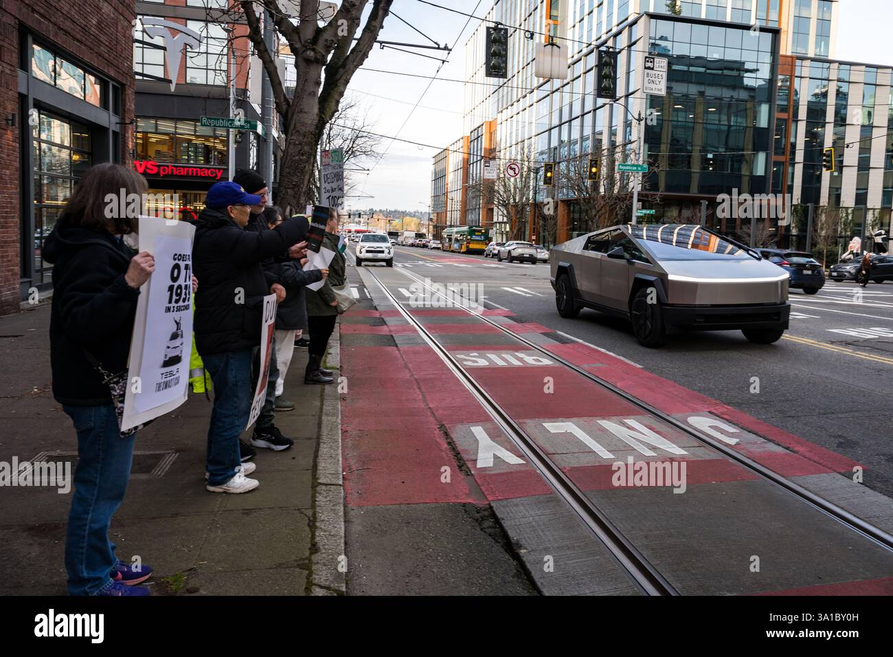 Seattle, USA. 7th Mar 2025. Activists gather at the South Lake Union ...