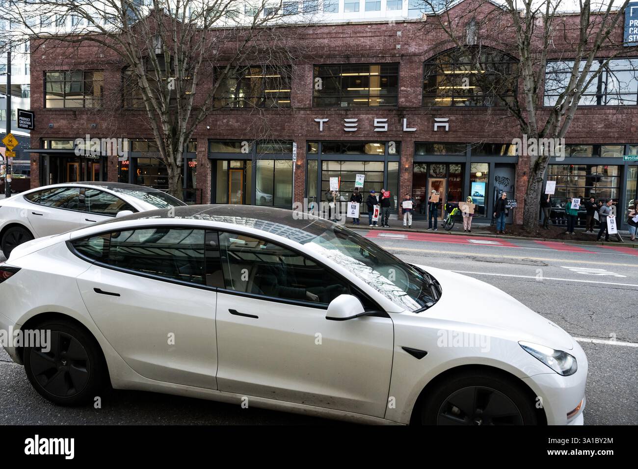 Seattle, USA. 7th Mar 2025. Activists gather at the South Lake Union ...