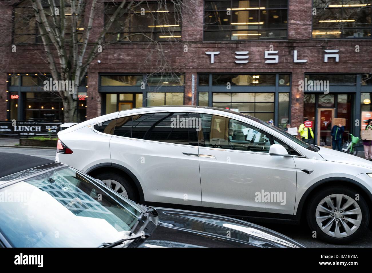 Seattle, USA. 7th Mar 2025. Activists gather at the South Lake Union ...