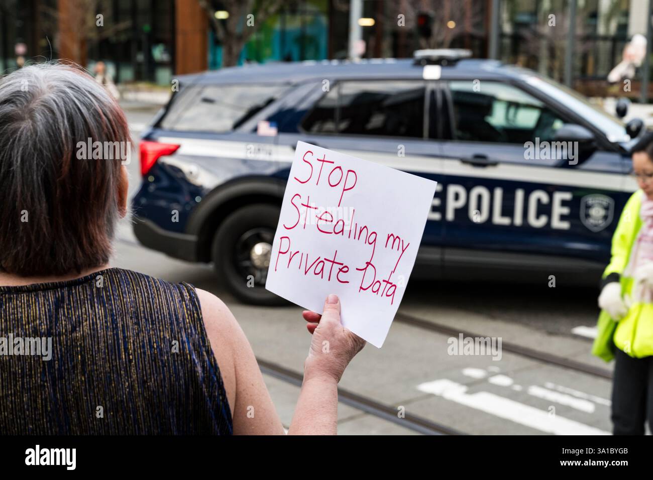 Seattle, USA. 7th Mar 2025. Activists gather at the South Lake Union ...