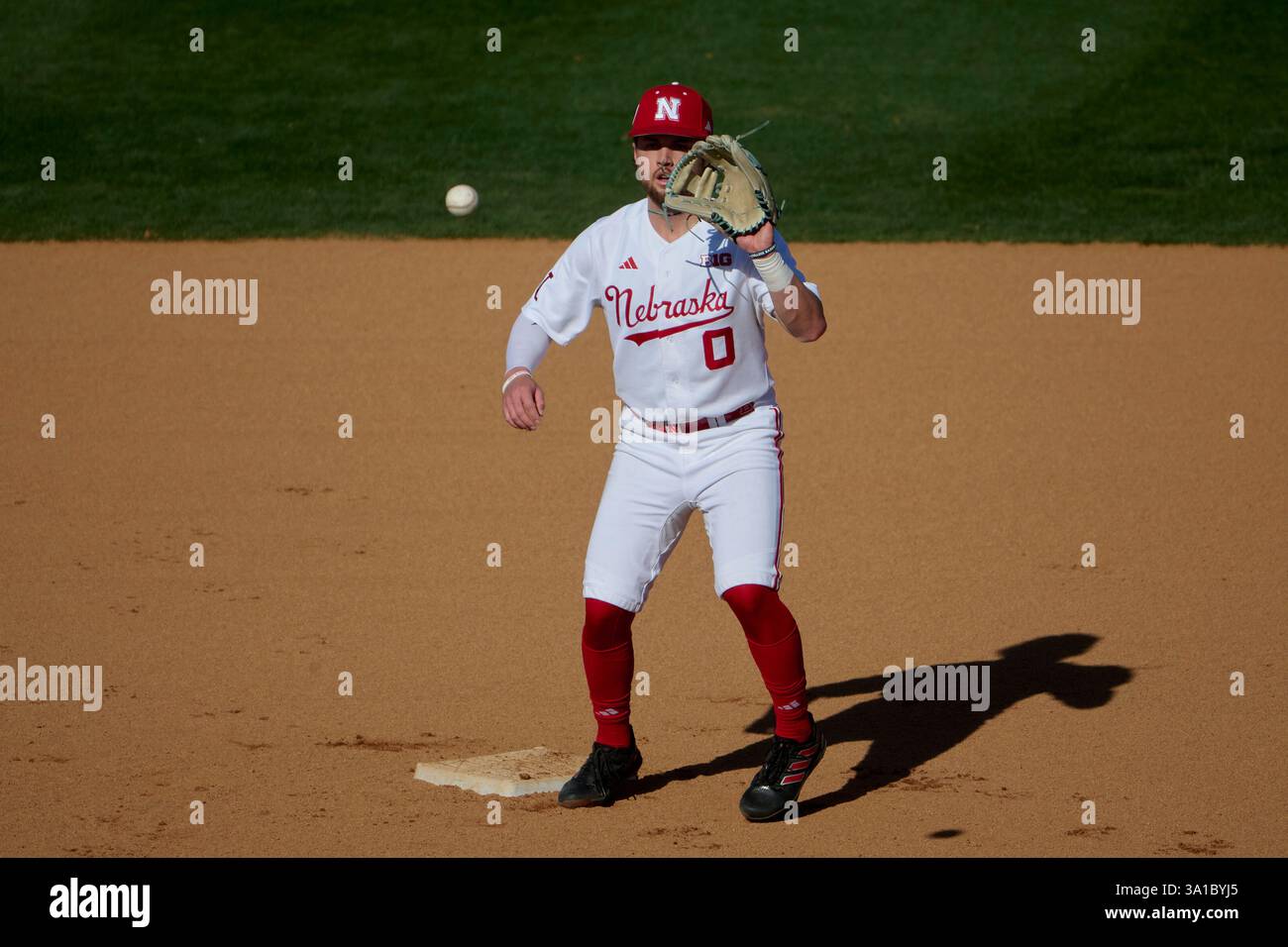 Nebraska Cornhuskers second baseman Cayden Brumbaugh (0) fields a throw ...