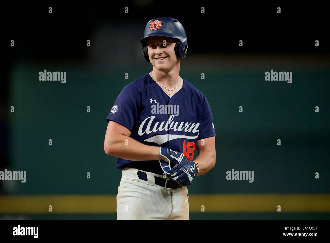 Auburn Tigers Ike Irish (18) on first after hitting an RBI single ...
