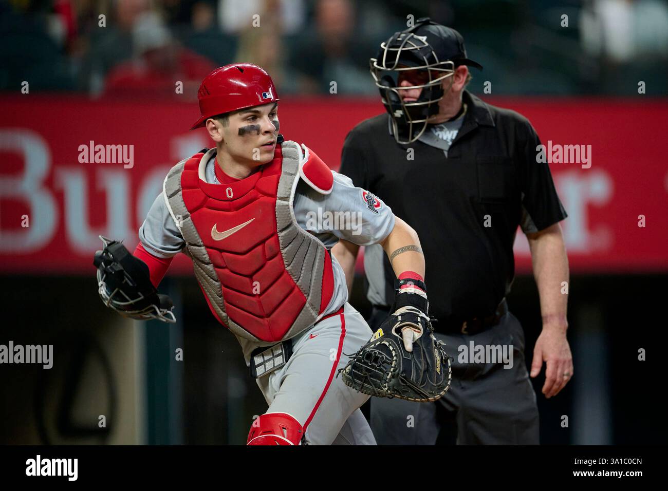 Ohio State Buckeyes catcher Mason Eckelman (16) checks the runner while ...