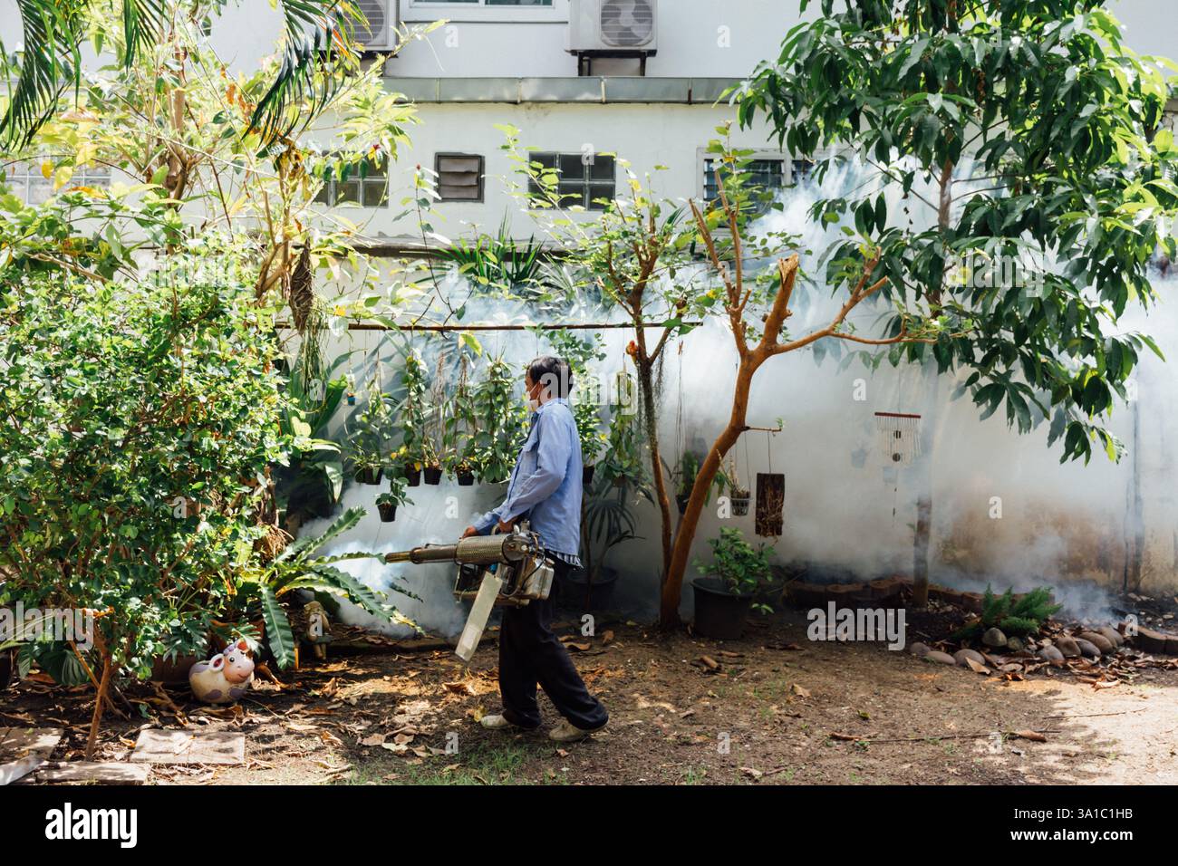 People fogging DDT spray for mosquito kill and protect by control ...