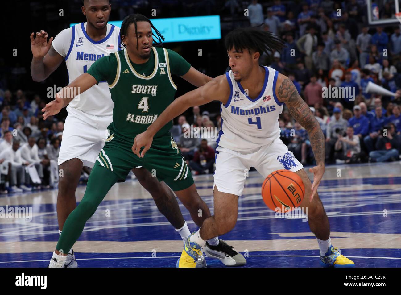 Memphis guard PJ Haggerty, right, dribbles while defended by South ...