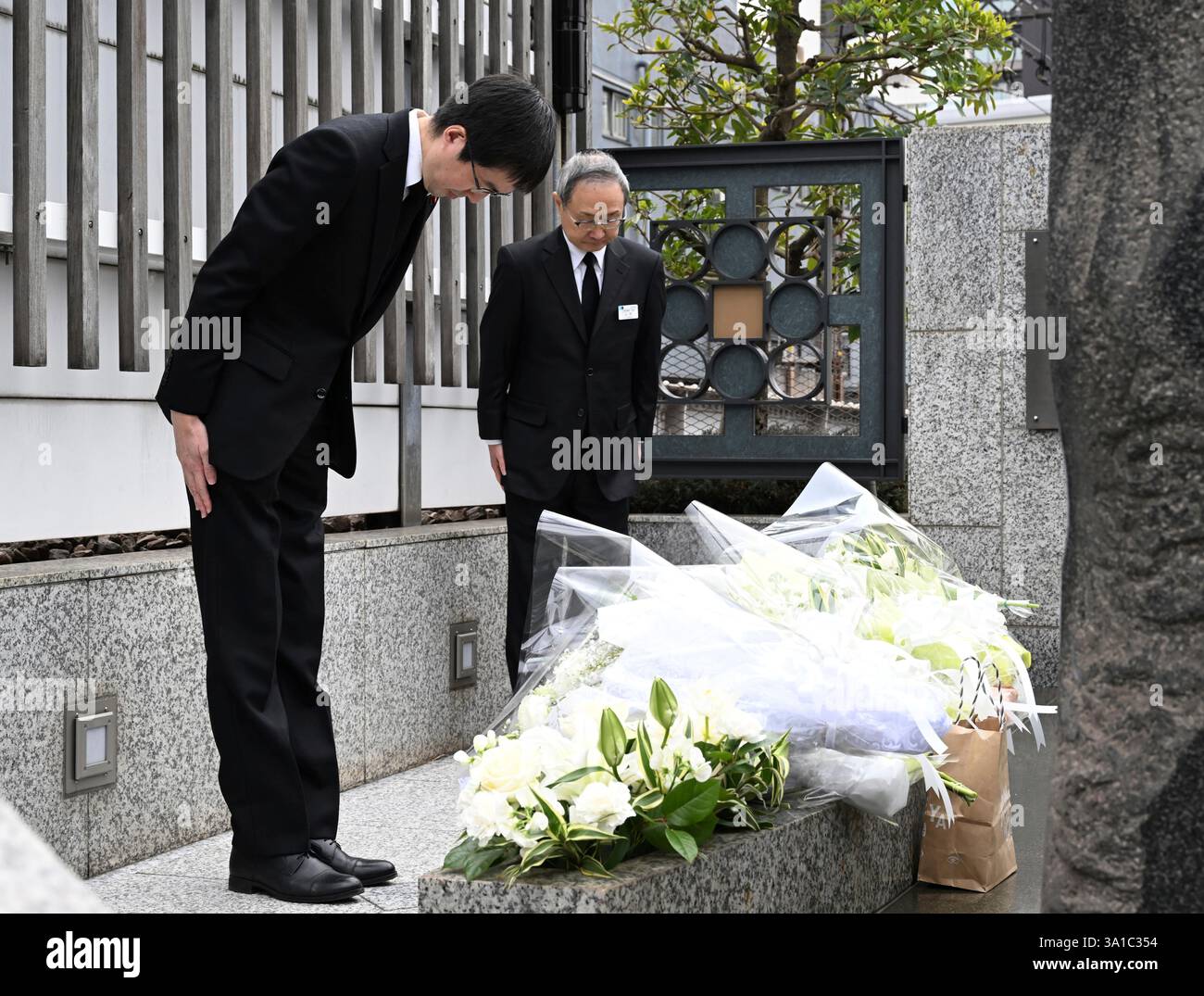 Yasuhiro Takami (L), Parliamentary Vice-Minister of Land ...