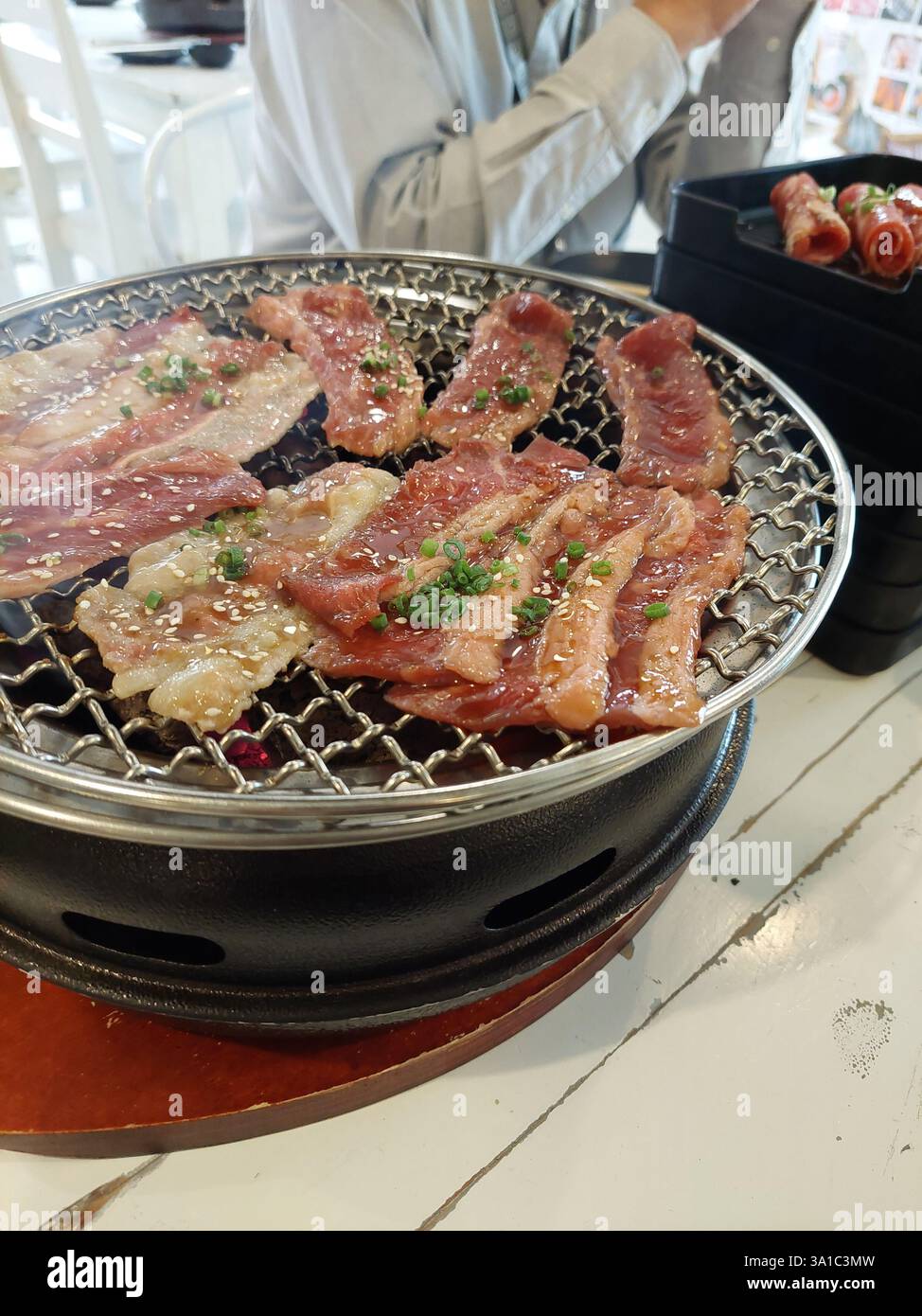 Grilled raw meat beef and pork (barbeque, bbq) a food cooking on wagyu ...