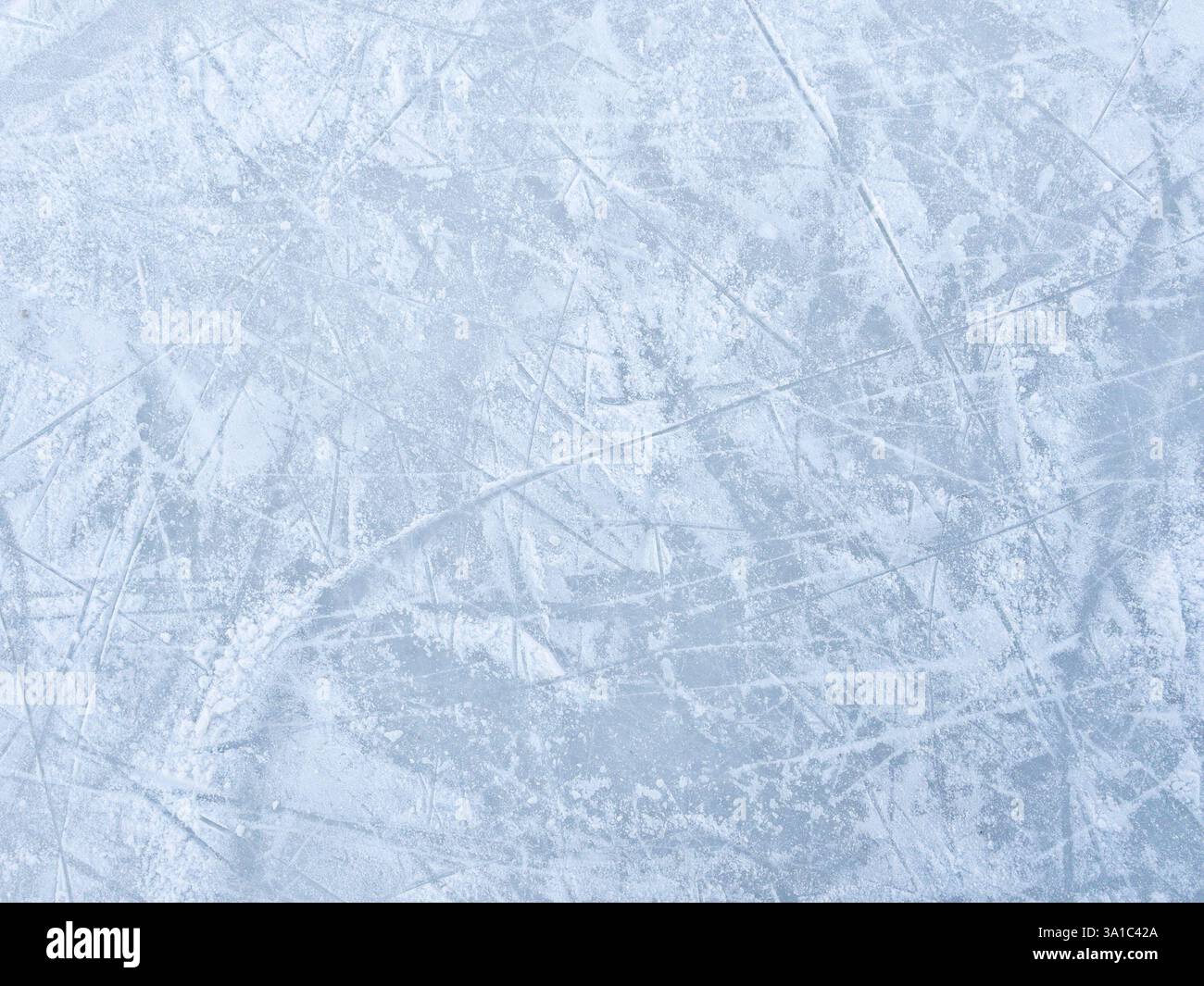 Ice background with marks from skating and hockey. Ice hockey rink ...