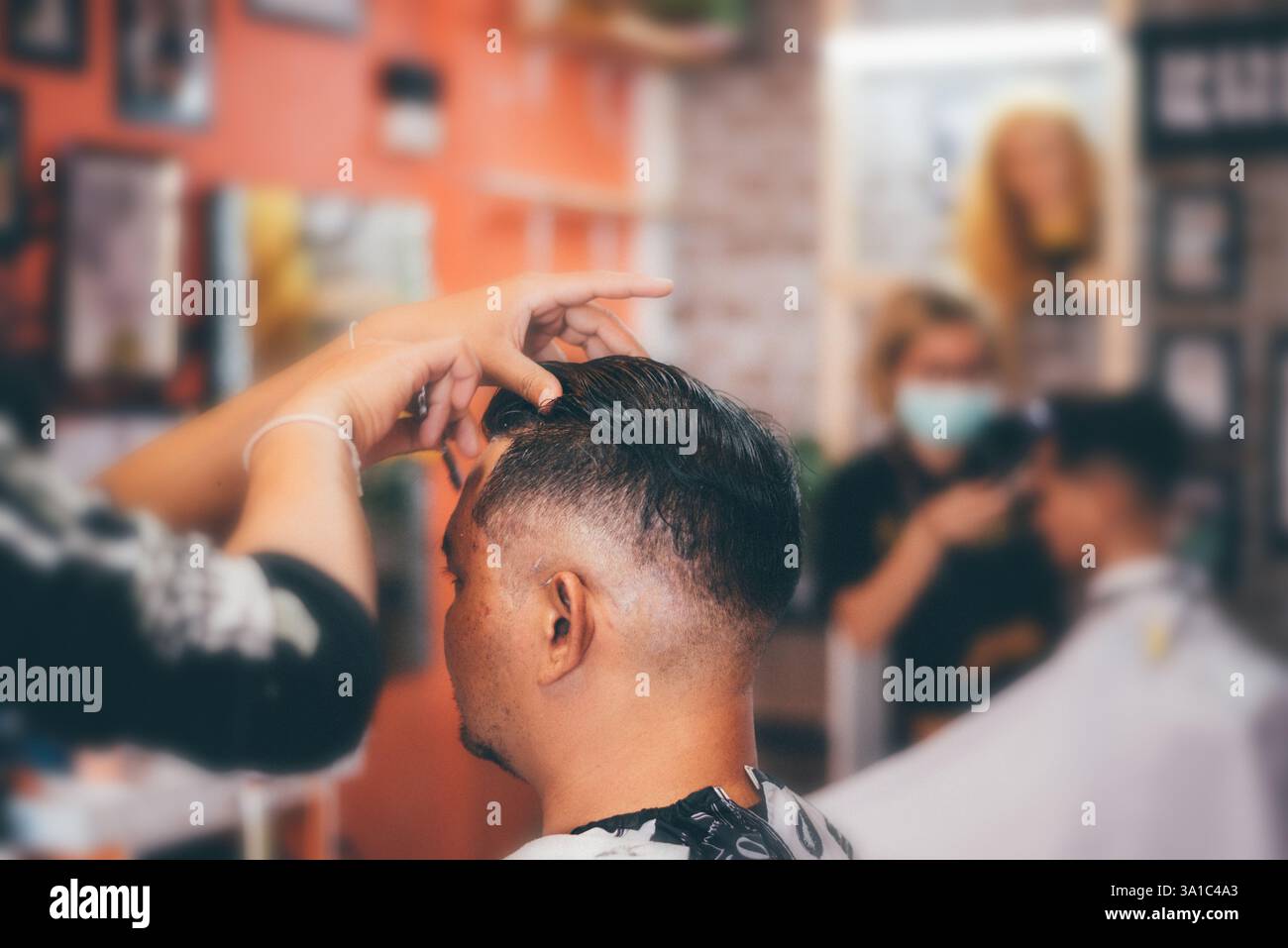 Thai man barber haircut a man customer in fashion vintage hairstyle at ...
