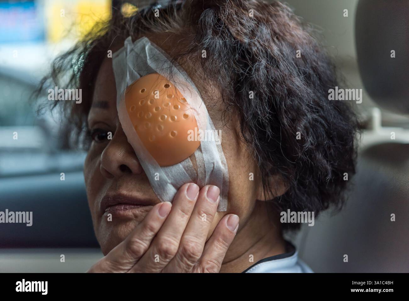 Patient asian elder women 60s with black hair and wrinkled on face show ...