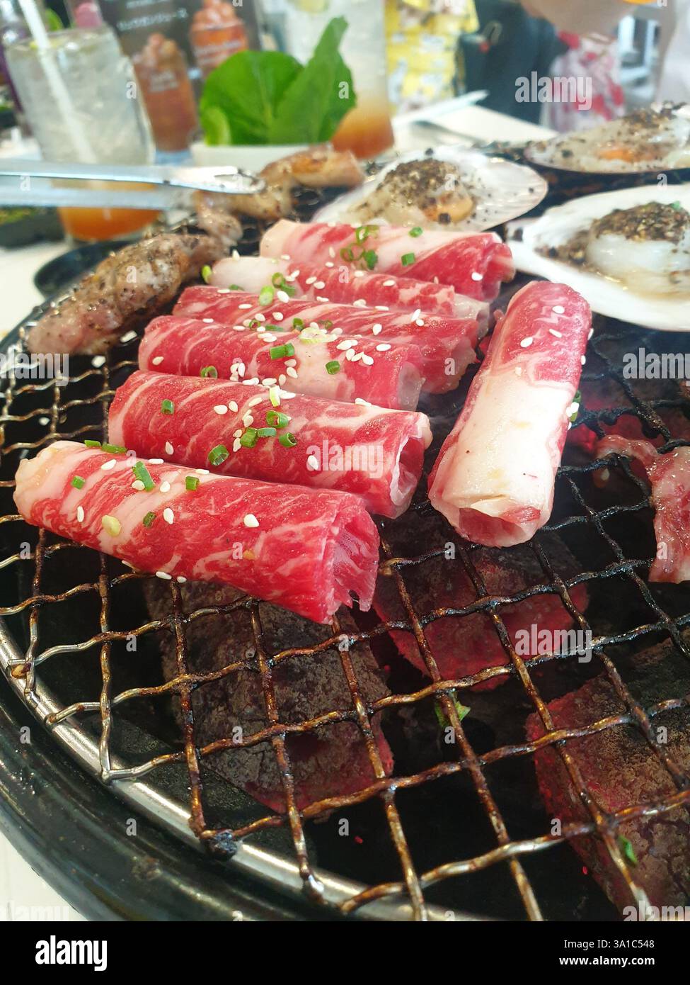 Grilled raw meat beef and pork (barbeque, bbq) a food cooking on wagyu ...