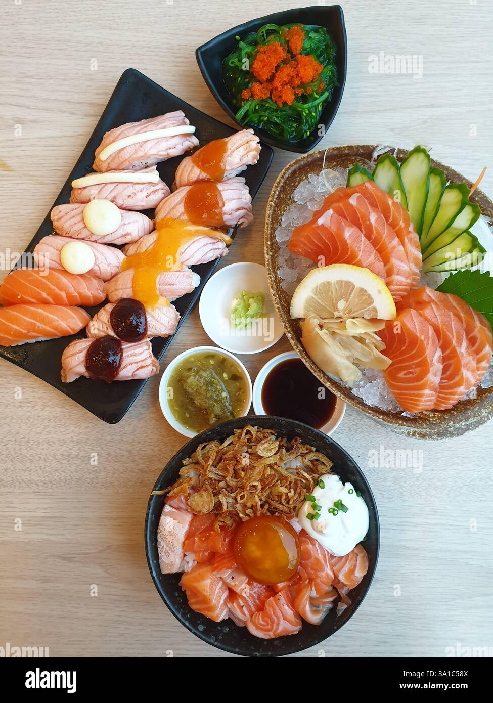 Japanese food sashimi salmon and set different types of sushi with ...