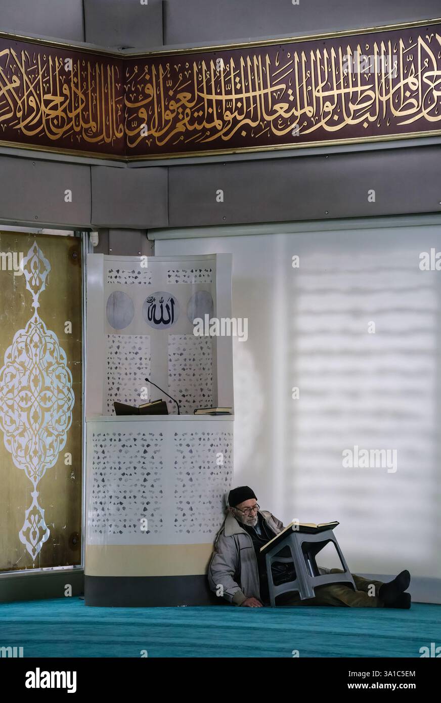 Istanbul, Turkey, Turkiye. Sakirin Mosque. Worshiper Reading the Quran ...